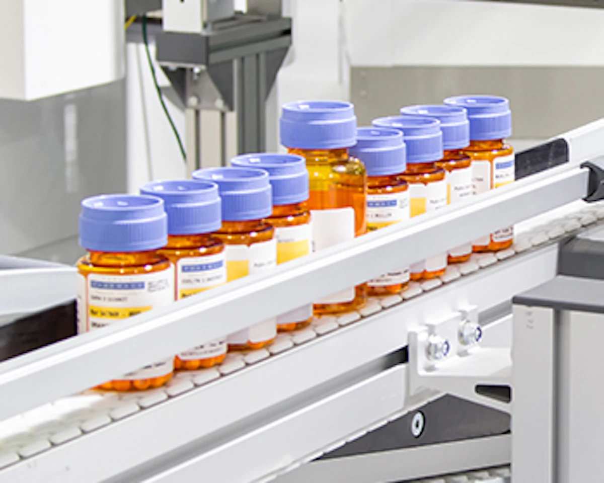 Pharma Cap Sealing: Handling Two Bottles Sizes on One Line | Healthcare ...